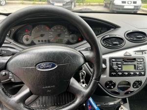Pelēks Ford Focus 2004 Panevēža, ar dzinēja tilpumu 1.80 L un nobraukumu 275 tūkst. km par 900 €, foto 11 vietnē AUTOMOTO.COM.LV