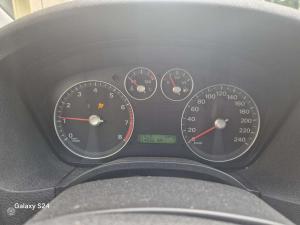 Pelēks Ford Focus 2005 Kauņa, ar dzinēja tilpumu 1.60 L un nobraukumu 215 tūkst. km par 900 €, foto 12 vietnē AUTOMOTO.COM.LV