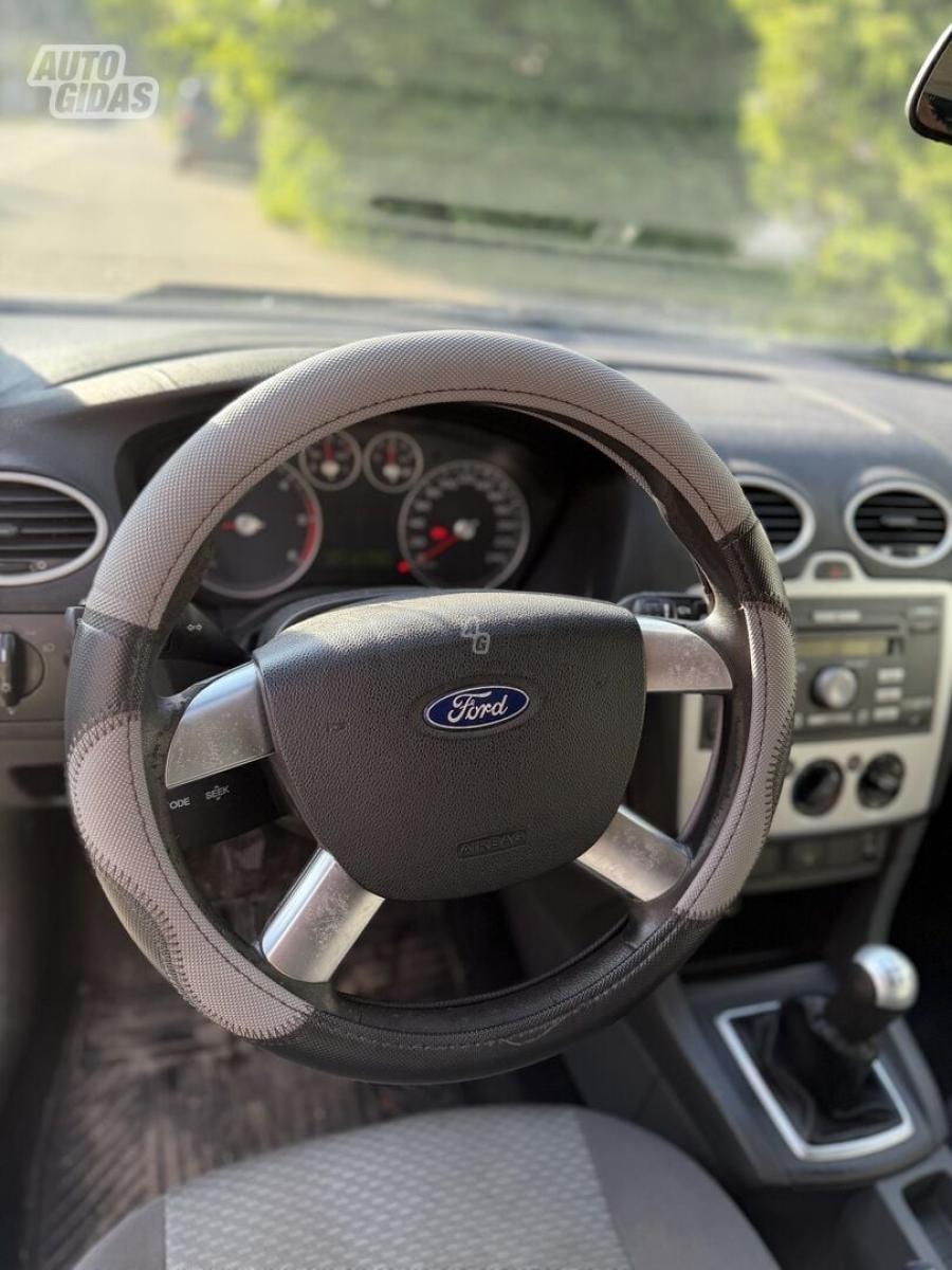 Pelēks Ford Focus 2007 Kauņa, ar dzinēja tilpumu 1.60 L un nobraukumu 400 tūkst. km par 600 €, foto 18 vietnē AUTOMOTO.COM.LV