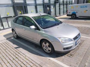 Grey Ford Focus 2008 in Vilnius, with an engine capacity of 1.60 L and mileage of 221 thousand km for 1150 €, photo  on AUTOMOTO.COM.LV