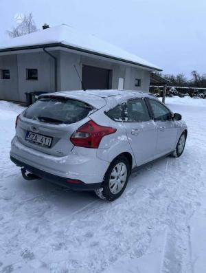 Grey Ford Focus 2011 in Alytus, with an engine capacity of 1.56 L and mileage of 312 thousand km for 1200 €, photo 6 on AUTOMOTO.COM.LV