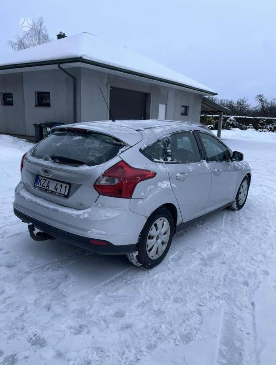 Grey Ford Focus 2011 in Alytus, with an engine capacity of 1.56 L and mileage of 312 thousand km for 1200 €, photo 6 on AUTOMOTO.COM.LV