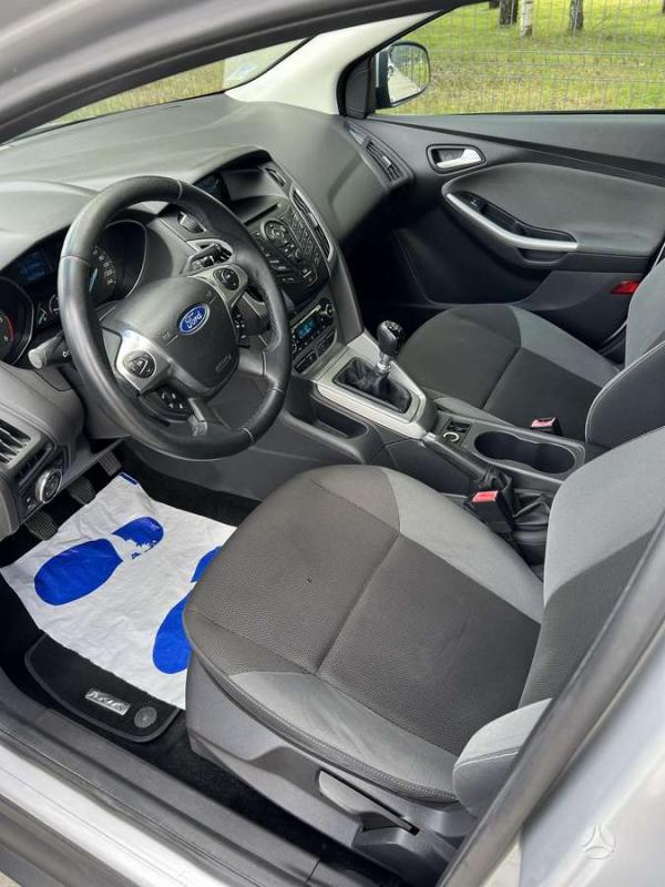 Grey Ford Focus 2011 in Taurage, with an engine capacity of 1.60 L and mileage of 264 thousand km for 2999 €, photo 8 on AUTOMOTO.COM.LV