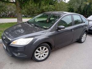 Grey Ford Focus 2011 in Vilnius, with an engine capacity of 1.56 L and mileage of 227 thousand km for 1599 €, photo  on AUTOMOTO.COM.LV