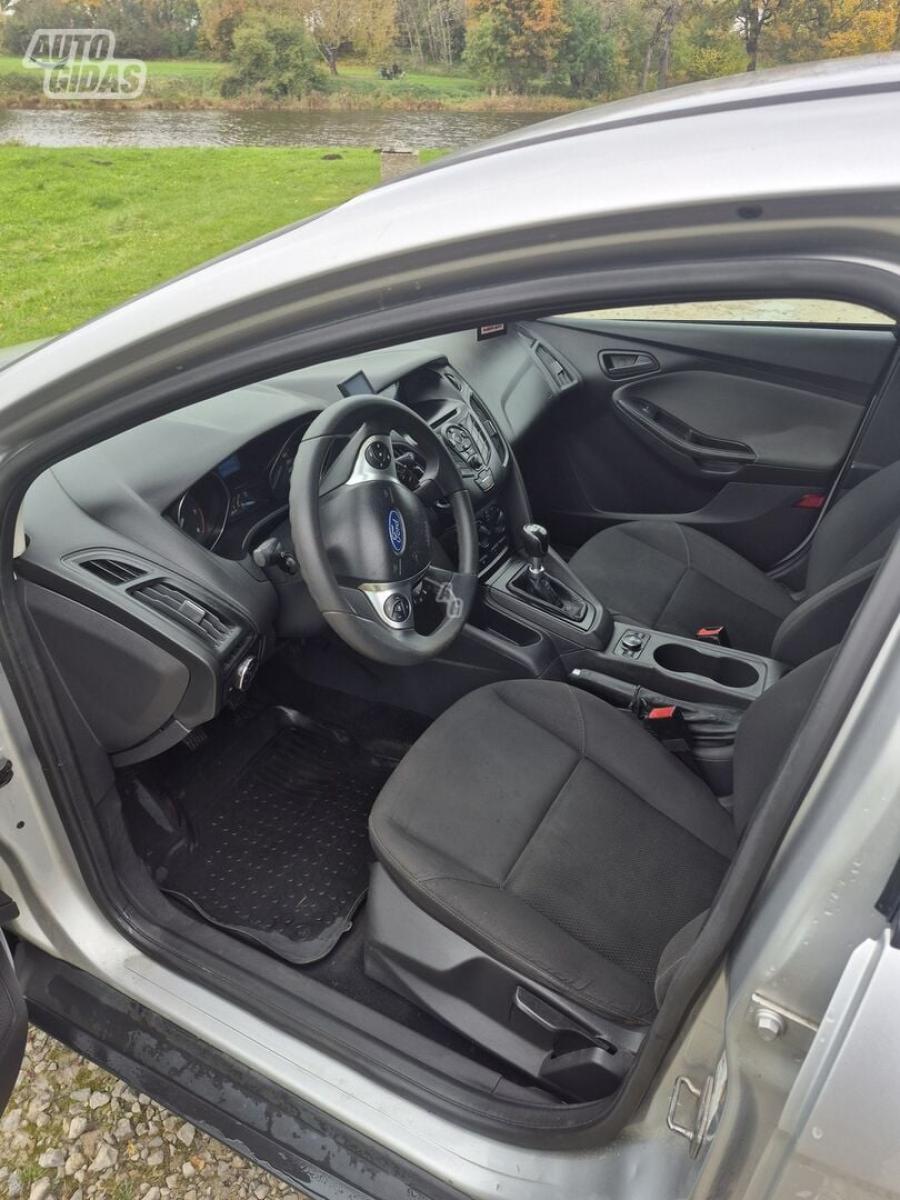 Grey Ford Focus 2011 in Kelme, with an engine capacity of 1.60 L and mileage of 309 thousand km for 900 €, photo 7 on AUTOMOTO.COM.LV