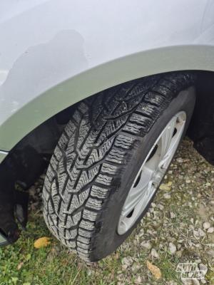 Grey Ford Focus 2011 in Kelme, with an engine capacity of 1.60 L and mileage of 309 thousand km for 900 €, photo 11 on AUTOMOTO.COM.LV