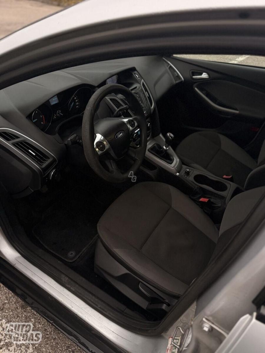 Grey Ford Focus 2011 in Kaunas, with an engine capacity of 1.60 L and mileage of 305 thousand km for 2400 €, photo 14 on AUTOMOTO.COM.LV