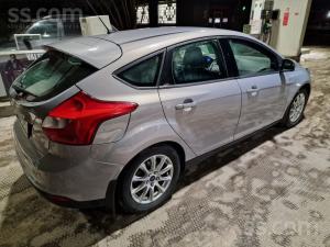 Grey Ford Focus 2014 in Riga, with an engine capacity of 1.60 L and mileage of 0 thousand km for 4970 €, photo 8 on AUTOMOTO.COM.LV