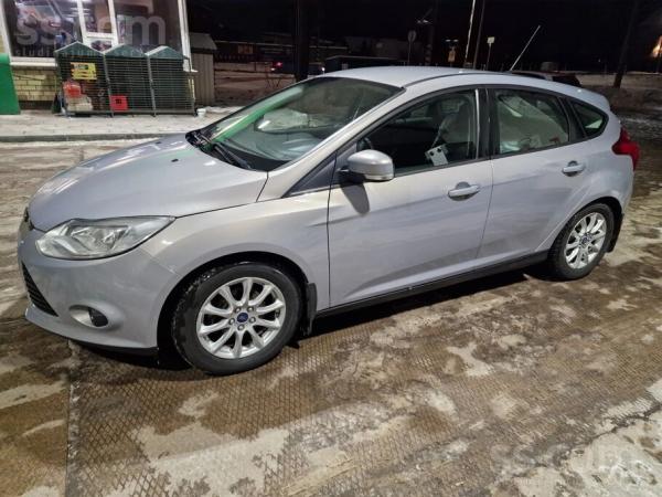 Grey Ford Focus 2014 in Riga, with an engine capacity of 1.60 L and mileage of 154 thousand km for 4370 €, photo 6 on AUTOMOTO.COM.LV