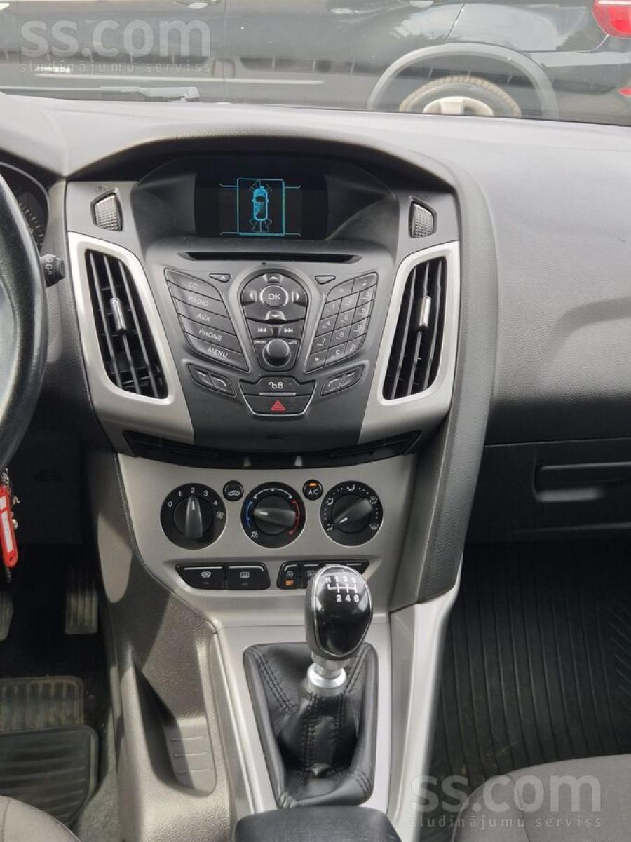 Grey Ford Focus 2014 in Riga, with an engine capacity of 1.60 L and mileage of 203 thousand km for 3890 €, photo 12 on AUTOMOTO.COM.LV