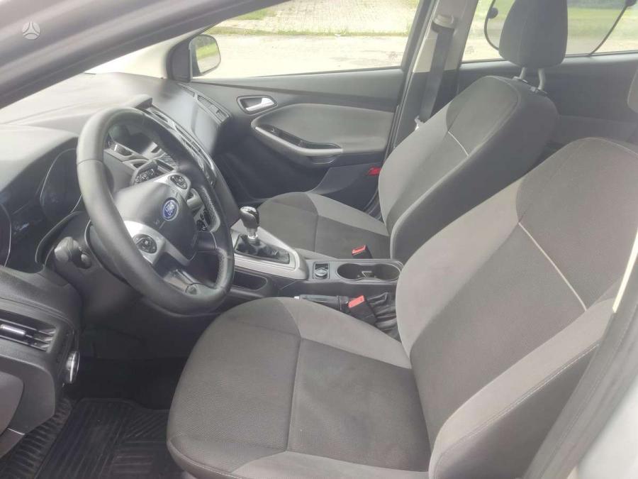 Grey Ford Focus 2014 in Panevezys, with an engine capacity of 1.56 L and mileage of 177 thousand km for 1990 €, photo 12 on AUTOMOTO.COM.LV