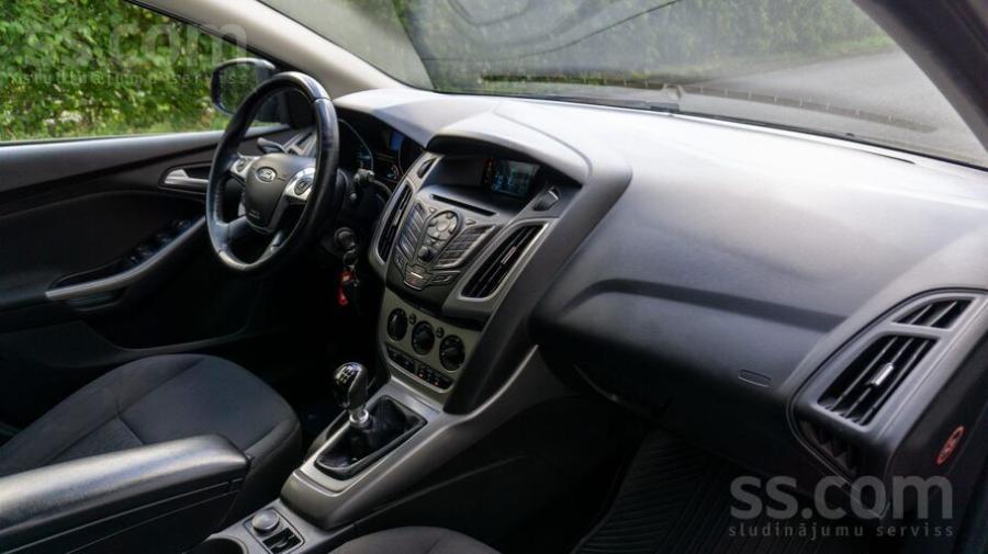 Grey Ford Focus 2014 in Riga, with an engine capacity of 1.60 L and mileage of 203 thousand km for 3190 €, photo 11 on AUTOMOTO.COM.LV