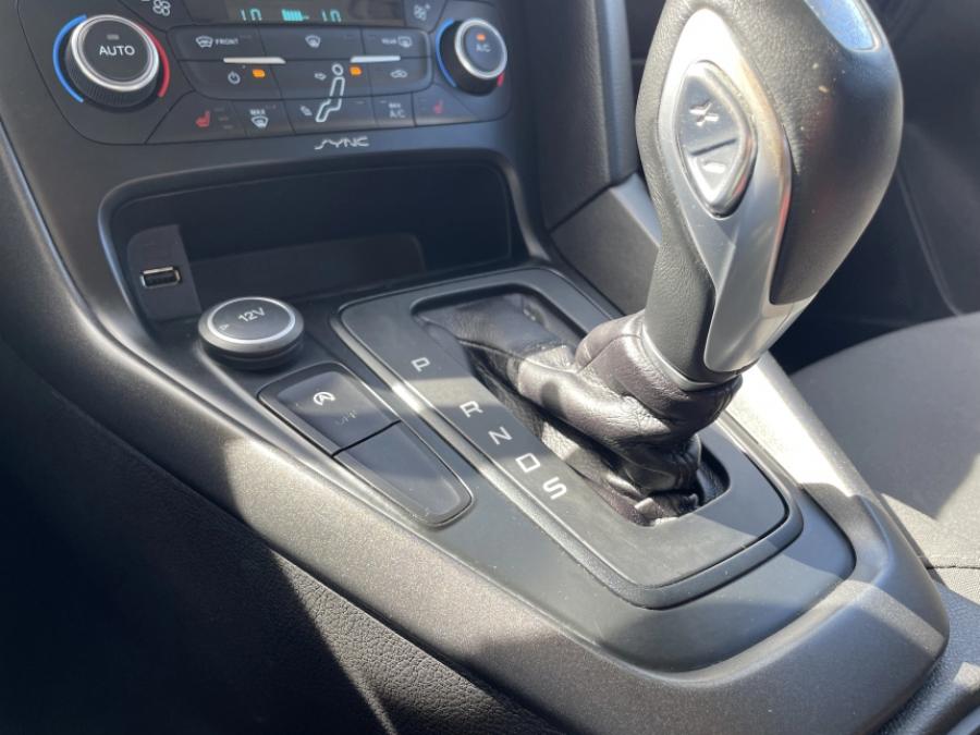 Grey Ford Focus 2016 in Riga, with an engine capacity of 1.00 L and mileage of 202 thousand km for 5800 €, photo 19 on AUTOMOTO.COM.LV