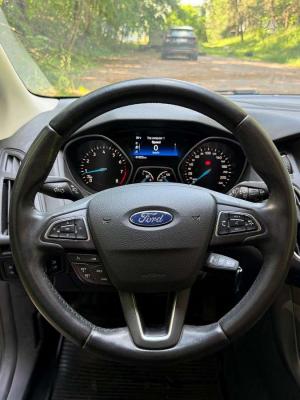 Pelēks Ford Focus 2017 Viļņa, ar dzinēja tilpumu 1.00 L un nobraukumu 92 tūkst. km par 6300 €, foto 13 vietnē AUTOMOTO.COM.LV