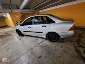 Grey Ford Focus 2001 in Vilnius, with an engine capacity of 1.60 L and mileage of 190 thousand km for 1000 €, photo 7 on AUTOMOTO.COM.LV