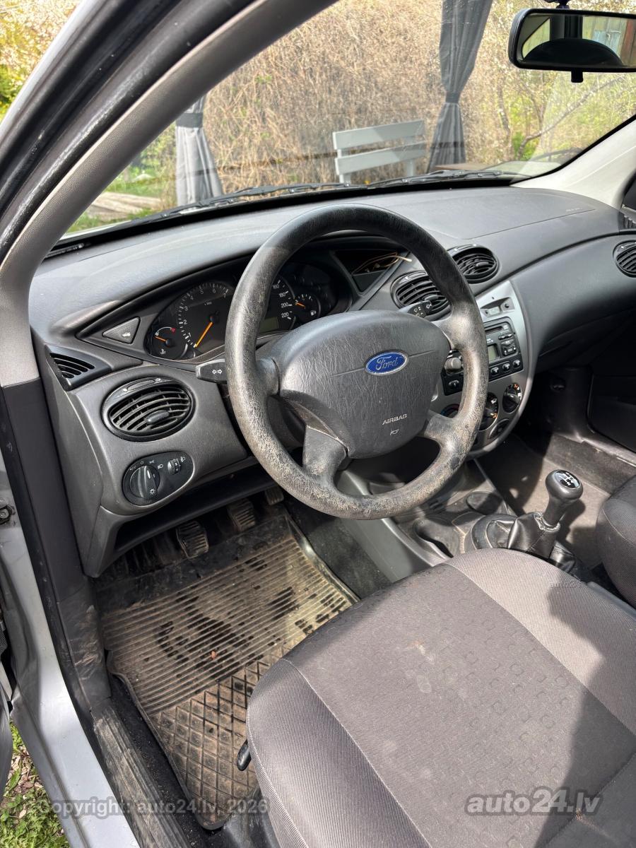 Pelēks Ford Focus 2003 Rīga, ar dzinēja tilpumu 1.60 L un nobraukumu 68 tūkst. km par 1300 €, foto 8 vietnē AUTOMOTO.COM.LV