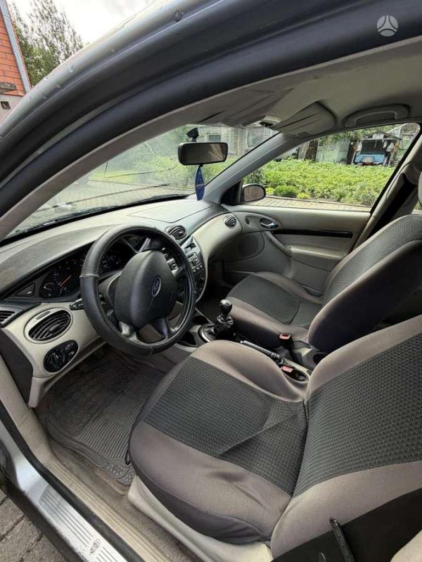 Pelēks Ford Focus 2004 Šauļi, ar dzinēja tilpumu 1.75 L un nobraukumu 203 tūkst. km par 1100 €, foto 5 vietnē AUTOMOTO.COM.LV