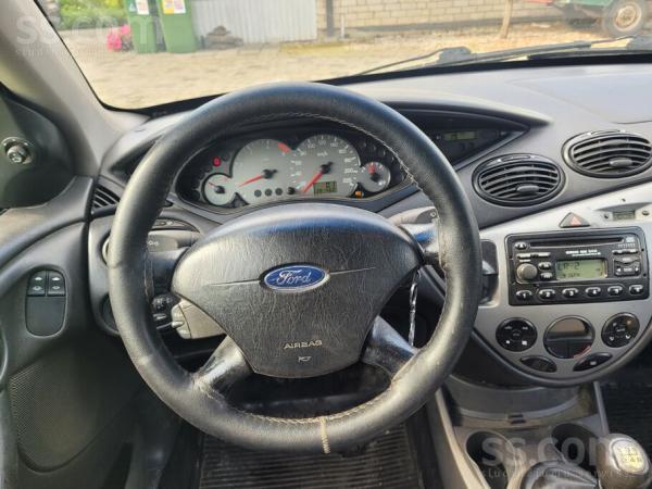 Grey Ford Focus 2004 in Jelgava, with an engine capacity of 1.80 L and mileage of 391 thousand km for 440 €, photo 7 on AUTOMOTO.COM.LV