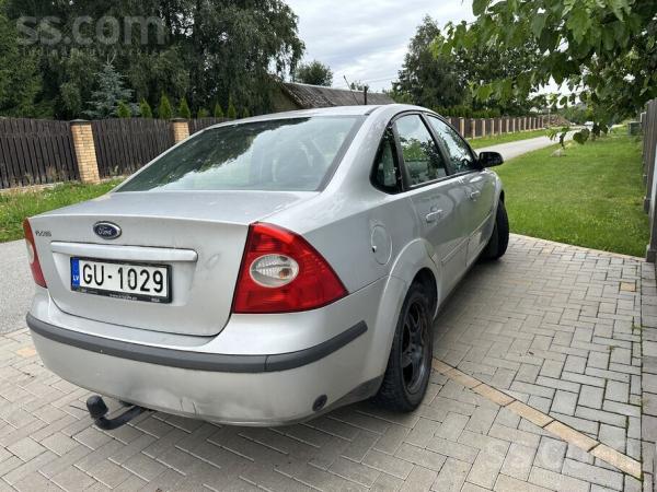 Pelēks Ford Focus 2007 Rīga, ar dzinēja tilpumu 1.60 L un nobraukumu 403 tūkst. km par 1000 €, foto 4 vietnē AUTOMOTO.COM.LV