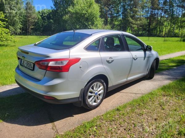 Grey Ford Focus 2014 in Riga, with an engine capacity of 1.60 L and mileage of 175 thousand km for 2900 €, photo 5 on AUTOMOTO.COM.LV