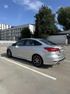 Grey Ford Focus 2015 in Vilnius, with an engine capacity of 2.00 L and mileage of 105 thousand km for 4700 €, photo 5 on AUTOMOTO.COM.LV