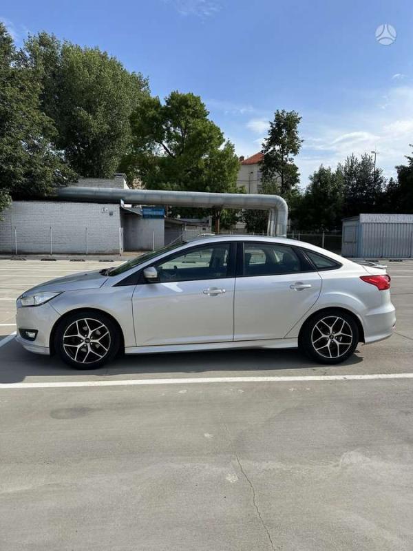 Grey Ford Focus 2015 in Vilnius, with an engine capacity of 2.00 L and mileage of 105 thousand km for 4700 €, photo 5 on AUTOMOTO.COM.LV