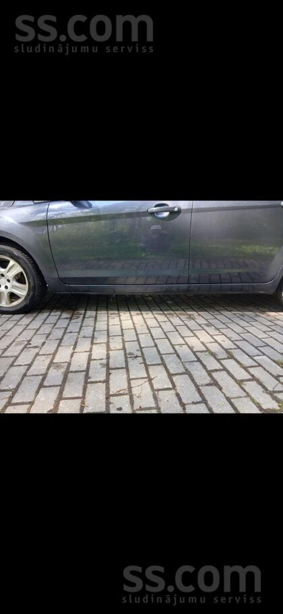 Grey Ford Focus 2009 in Riga, with an engine capacity of 2.00 L and mileage of 299 thousand km for 1790 €, photo 14 on AUTOMOTO.COM.LV