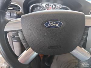 Pelēks Ford Focus 2010 Kauņa, ar dzinēja tilpumu 1.80 L un nobraukumu 186 tūkst. km par 3200 €, foto 10 vietnē AUTOMOTO.COM.LV