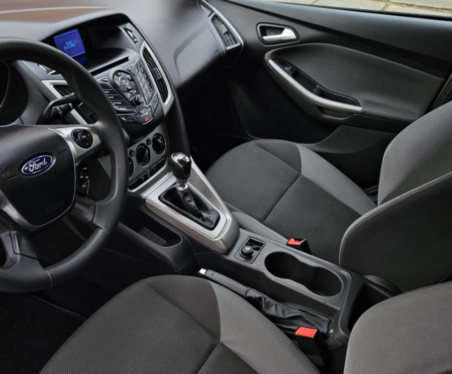 Grey Ford Focus 2011 in Riga, with an engine capacity of 1.60 L and mileage of 234 thousand km for 4490 €, photo 13 on AUTOMOTO.COM.LV