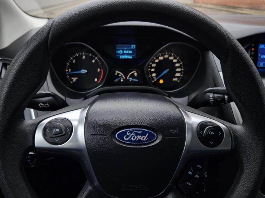 Grey Ford Focus 2011 in Riga, with an engine capacity of 1.60 L and mileage of 234 thousand km for 4490 €, photo 29 on AUTOMOTO.COM.LV