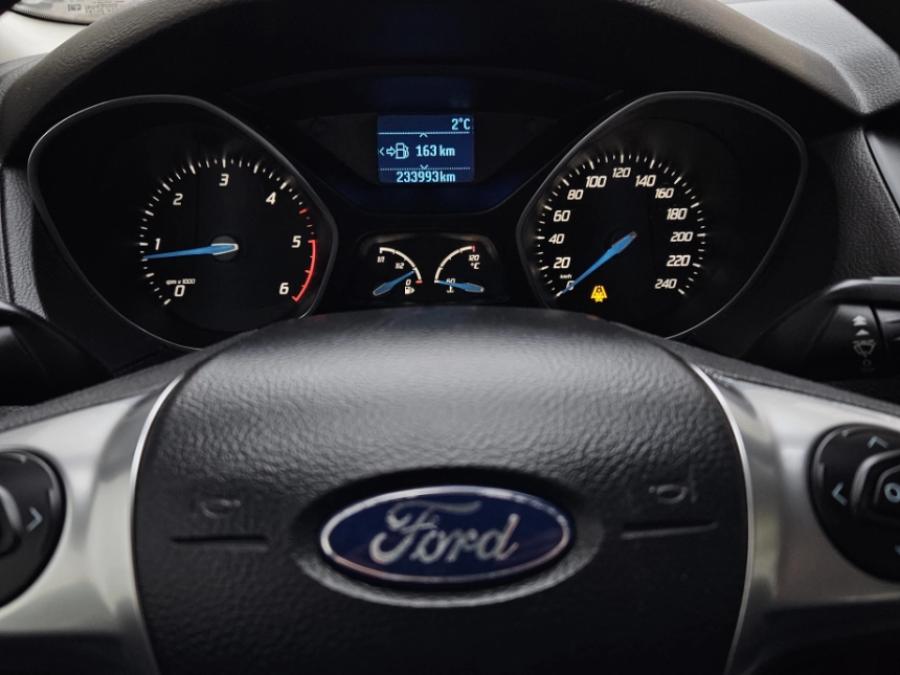 Grey Ford Focus 2011 in Riga, with an engine capacity of 1.60 L and mileage of 234 thousand km for 4490 €, photo 35 on AUTOMOTO.COM.LV