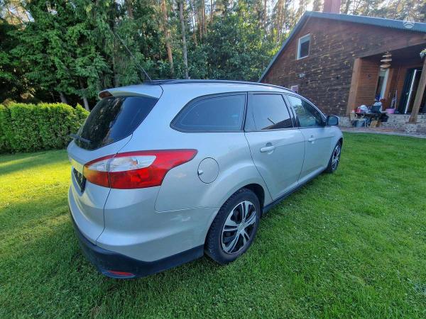 Grey Ford Focus 2011 in Ukmerge, with an engine capacity of 1.56 L and mileage of 280 thousand km for 2650 €, photo 4 on AUTOMOTO.COM.LV