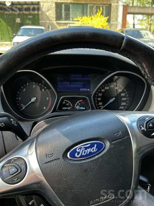 Grey Ford Focus 2013 in Riga, with an engine capacity of 2.00 L and mileage of 349 thousand km for 3350 €, photo 6 on AUTOMOTO.COM.LV