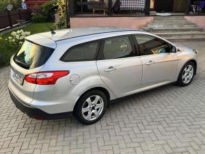 Grey Ford Focus 2013 in Rokiskis, with an engine capacity of 2.00 L and mileage of 318 thousand km for 3450 €, photo 4 on AUTOMOTO.COM.LV