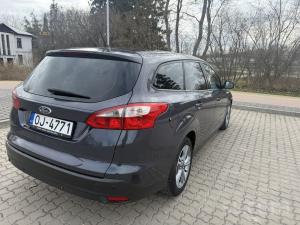 Grey Ford Focus 2014 in Saldus, with an engine capacity of 1.60 L and mileage of 252 thousand km for 4440 €, photo 8 on AUTOMOTO.COM.LV