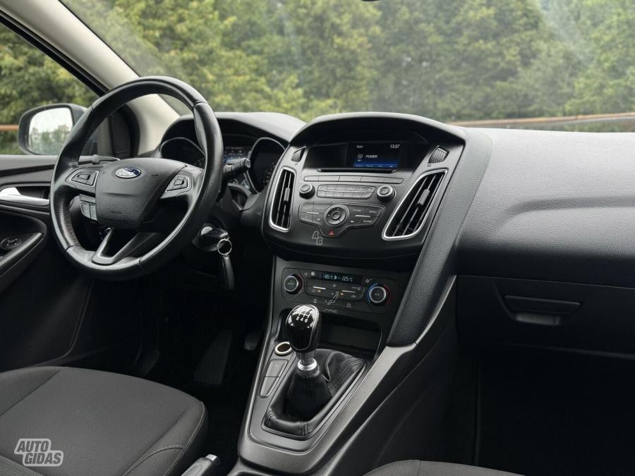 Pelēks Ford Focus 2017 Viļņa, ar dzinēja tilpumu 1.00 L un nobraukumu 80 tūkst. km par 5900 €, foto 18 vietnē AUTOMOTO.COM.LV