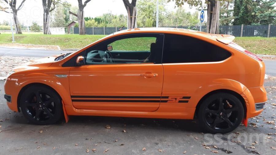 Orange Ford Focus 2007 in Riga, with an engine capacity of 2.50 L and mileage of 237 thousand km for 6500 €, photo 26 on AUTOMOTO.COM.LV