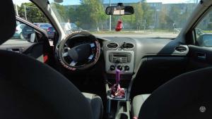 Orange Ford Focus 2008 in Vilnius, with an engine capacity of 1.60 L and mileage of 220 thousand km for 450 €, photo 12 on AUTOMOTO.COM.LV