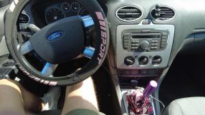 Orange Ford Focus 2008 in Vilnius, with an engine capacity of 1.60 L and mileage of 220 thousand km for 450 €, photo 14 on AUTOMOTO.COM.LV