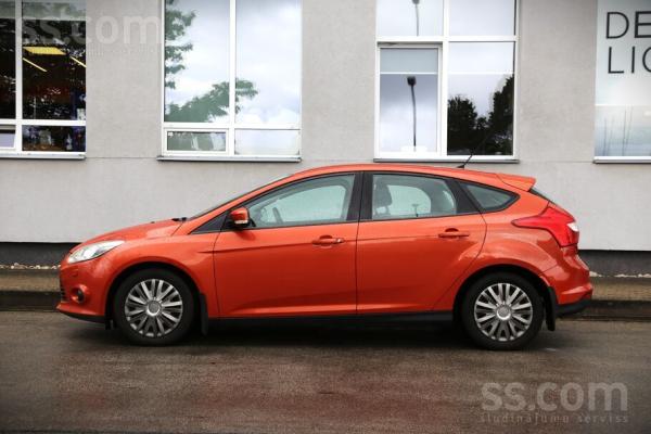 Orange Ford Focus 2011 in Riga, with an engine capacity of 1.60 L and mileage of 0 thousand km for 3495 €, photo 2 on AUTOMOTO.COM.LV