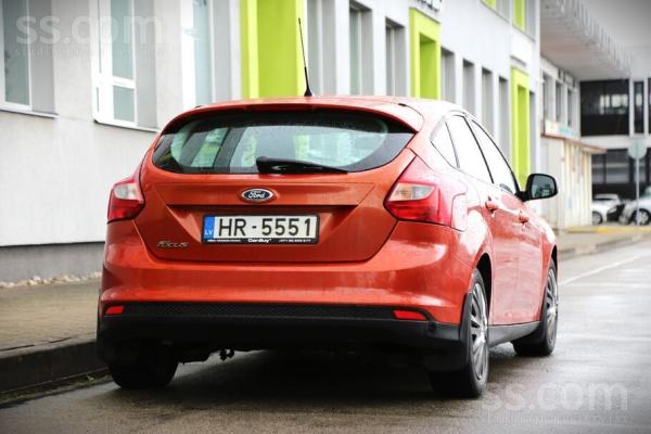 Orange Ford Focus 2011 in Riga, with an engine capacity of 1.60 L and mileage of 0 thousand km for 3495 €, photo 6 on AUTOMOTO.COM.LV