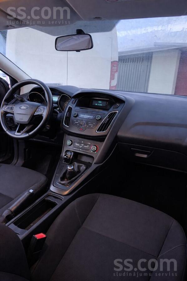 Orange Ford Focus 2015 in Jelgava, with an engine capacity of 1.60 L and mileage of 245 thousand km for 4750 €, photo 6 on AUTOMOTO.COM.LV
