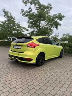Orange Ford Focus 2015 in Jelgava, with an engine capacity of 1.60 L and mileage of 248 thousand km for 4550 €, photo 7 on AUTOMOTO.COM.LV