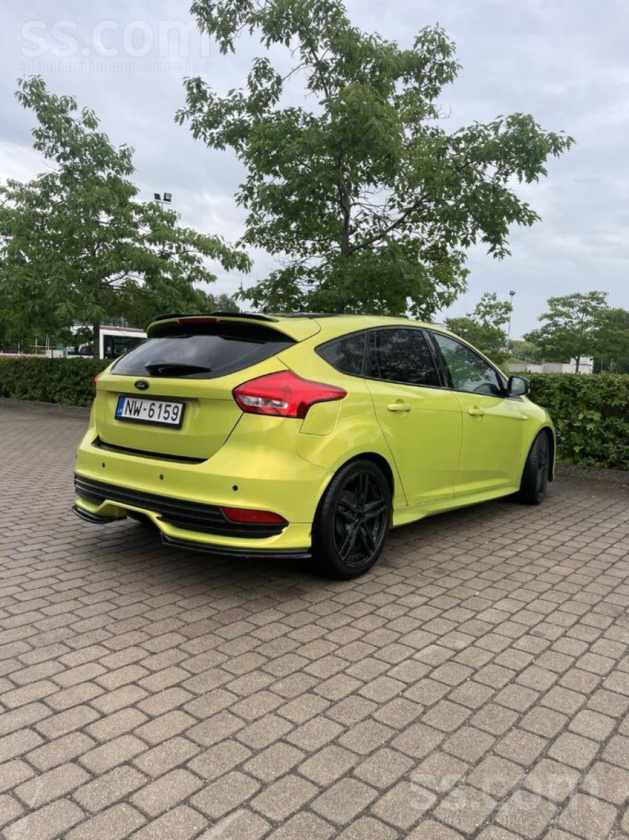 Orange Ford Focus 2015 in Jelgava, with an engine capacity of 1.60 L and mileage of 248 thousand km for 4550 €, photo 7 on AUTOMOTO.COM.LV