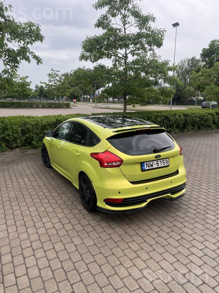 Orange Ford Focus 2015 in Jelgava, with an engine capacity of 1.60 L and mileage of 248 thousand km for 4550 €, photo 8 on AUTOMOTO.COM.LV