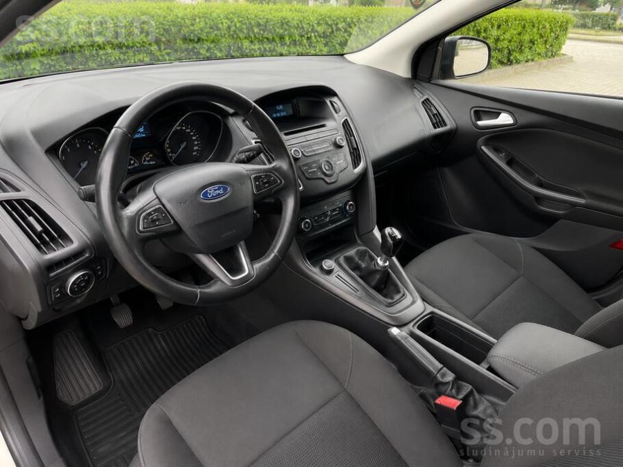 Orange Ford Focus 2015 in Jelgava, with an engine capacity of 1.60 L and mileage of 248 thousand km for 4550 €, photo 10 on AUTOMOTO.COM.LV