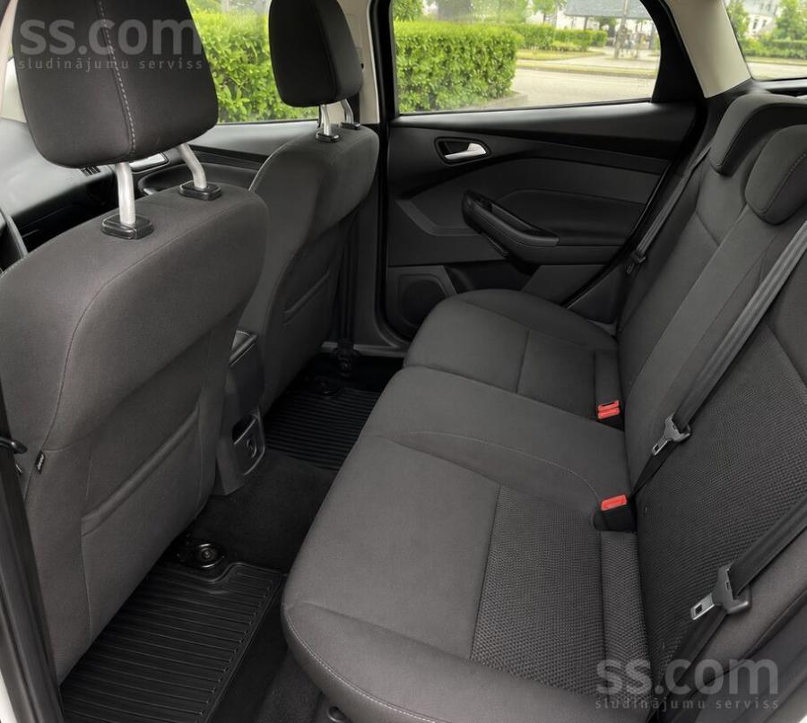 Orange Ford Focus 2015 in Jelgava, with an engine capacity of 1.60 L and mileage of 248 thousand km for 4550 €, photo 11 on AUTOMOTO.COM.LV