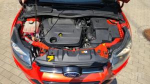 Orange Ford Focus 2013 in Riga, with an engine capacity of 2.00 L and mileage of 233 thousand km for 3750 €, photo 9 on AUTOMOTO.COM.LV