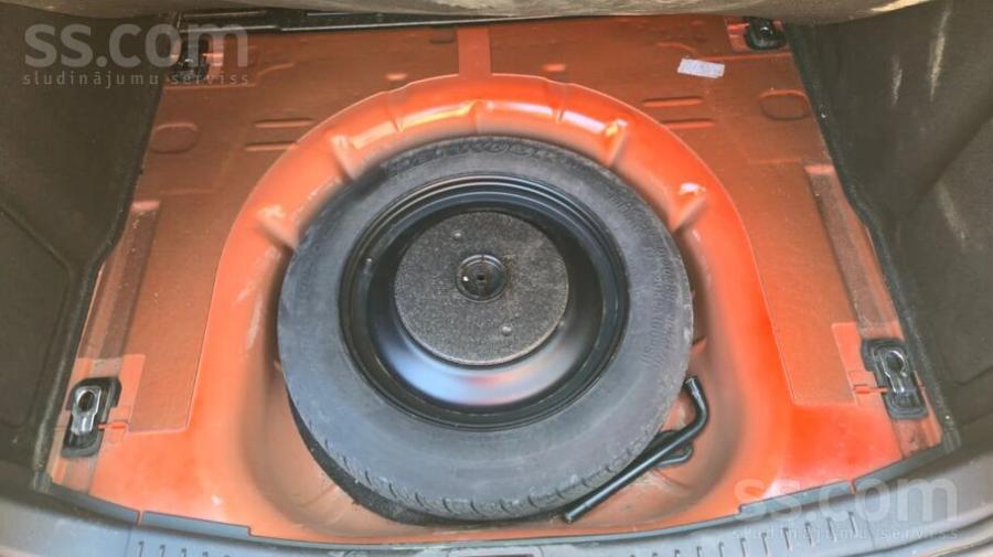 Orange Ford Focus 2013 in Riga, with an engine capacity of 2.00 L and mileage of 233 thousand km for 3750 €, photo 11 on AUTOMOTO.COM.LV