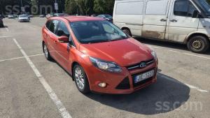 Orange Ford Focus 2013 in Riga, with an engine capacity of 2.00 L and mileage of 234 thousand km for 3450 €, photo 3 on AUTOMOTO.COM.LV